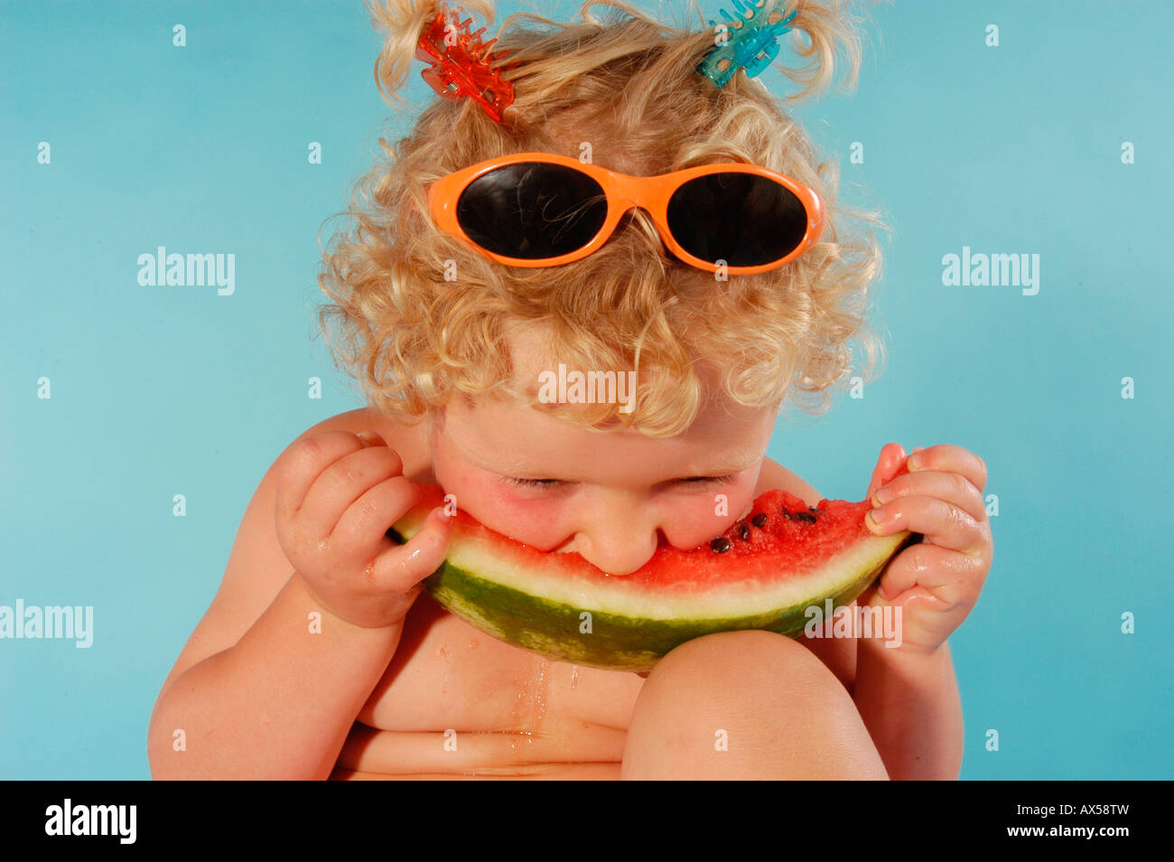Child with melon Stock Photo - Alamy