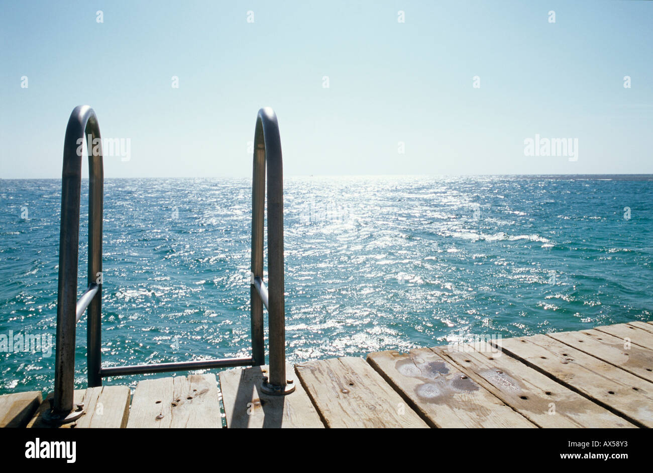 Pier with handrail Stock Photo - Alamy
