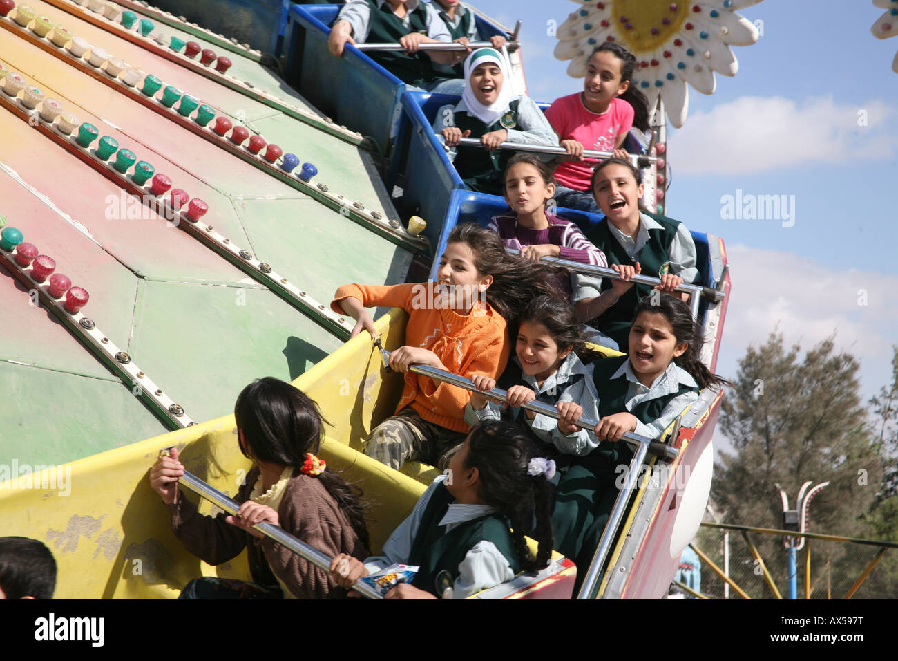 children playing at fair in Amman, jordan Stock Photo - Alamy
