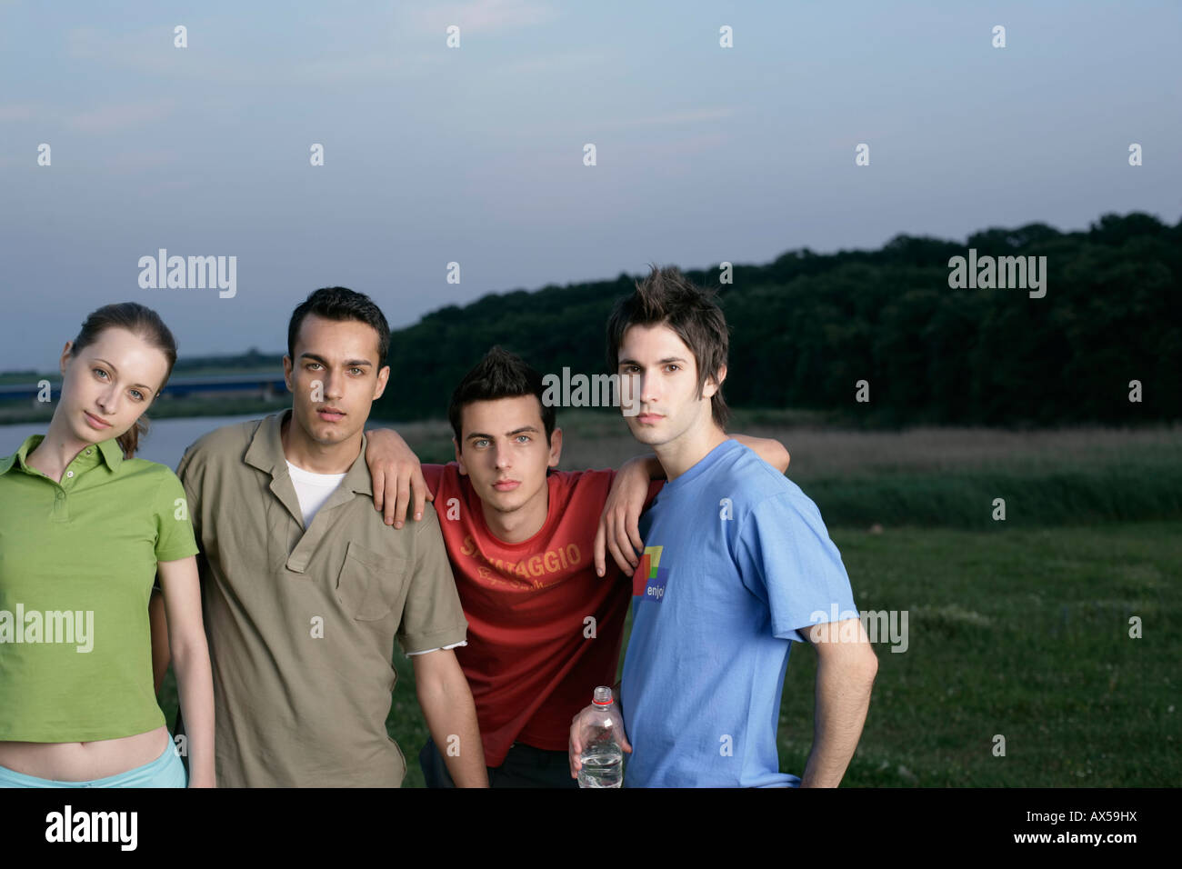 Four young people, group photo Stock Photo - Alamy