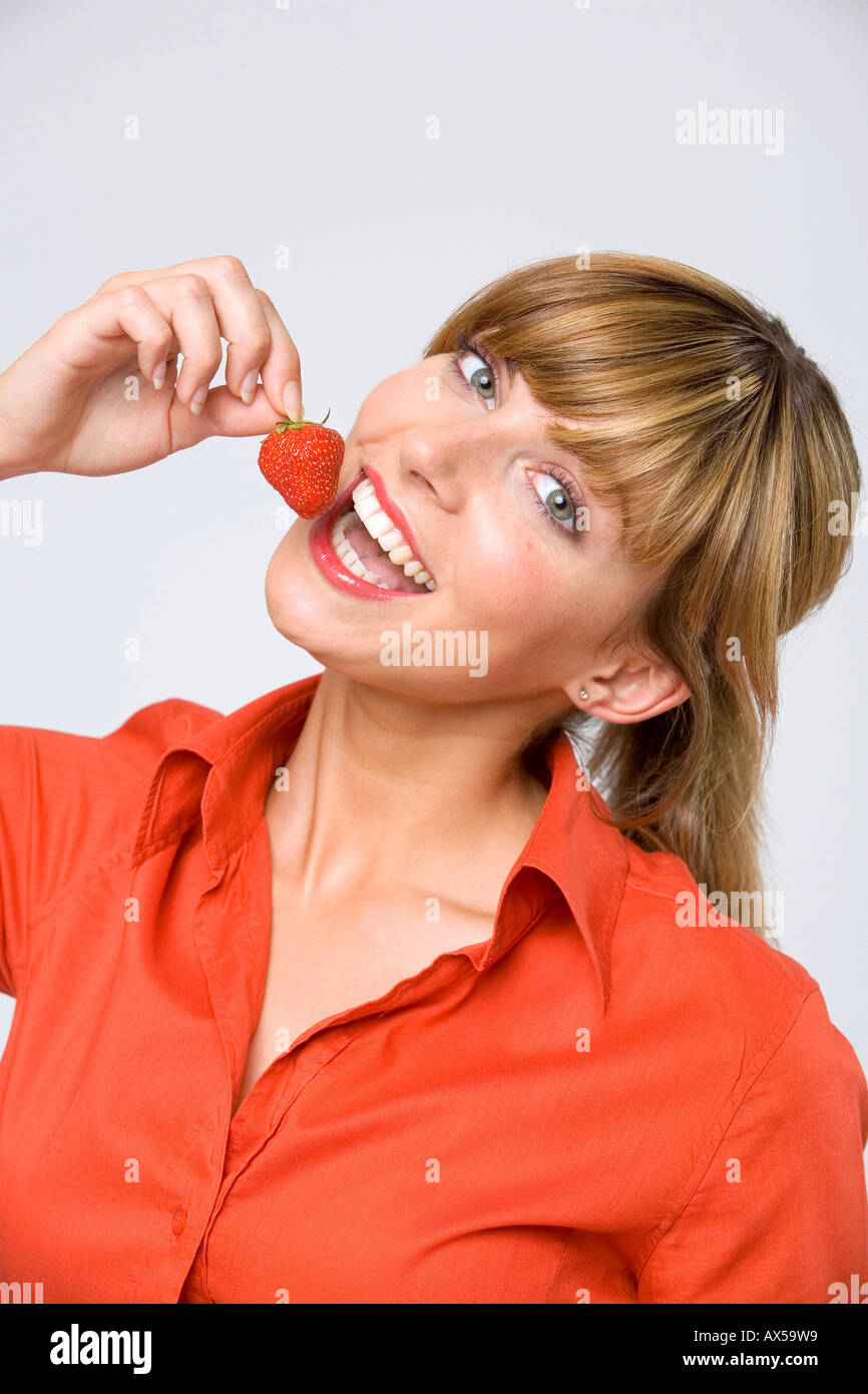 Woman eating berries cut out hi-res stock photography and images - Alamy