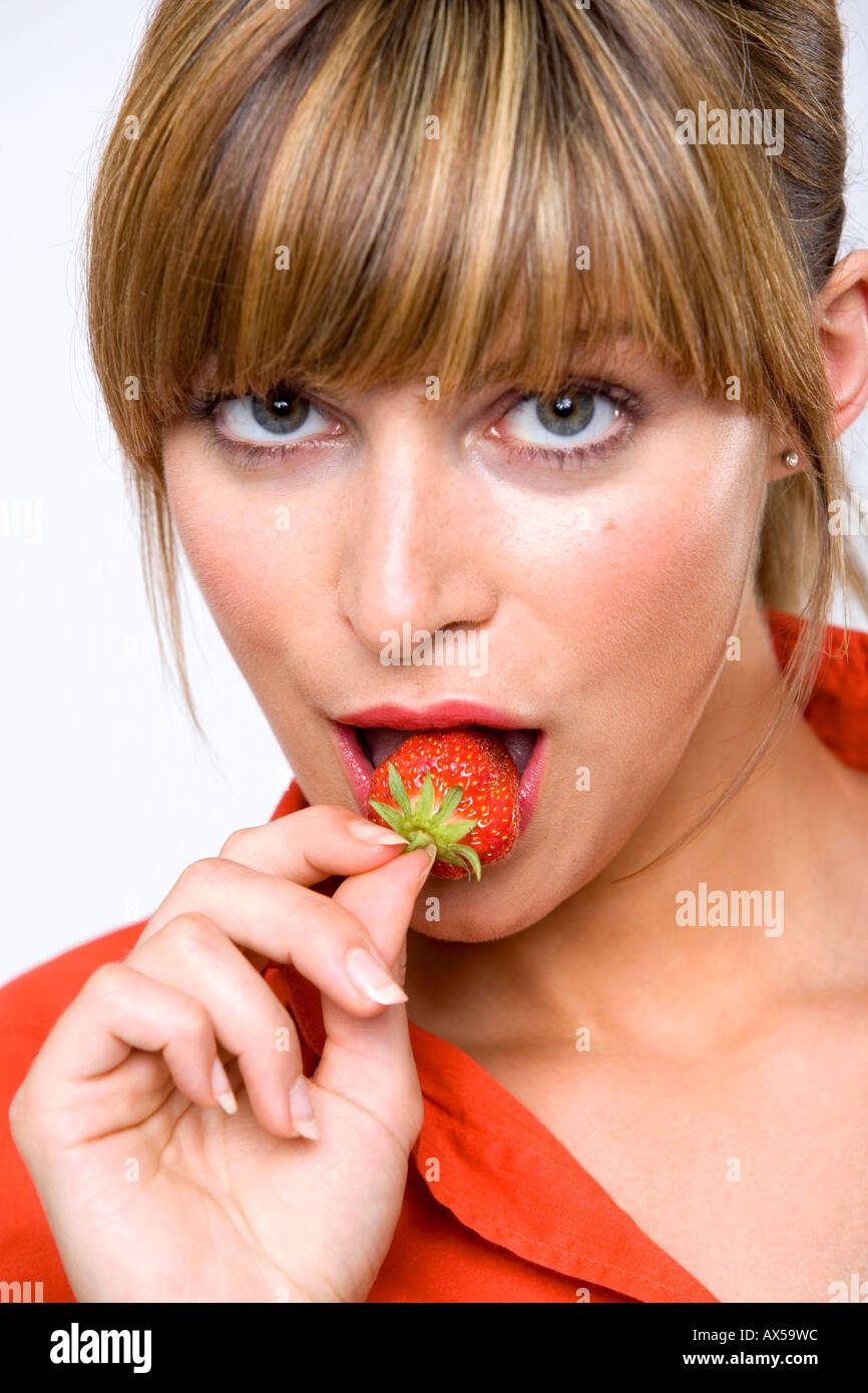 Woman eating berries cut out hi-res stock photography and images - Alamy