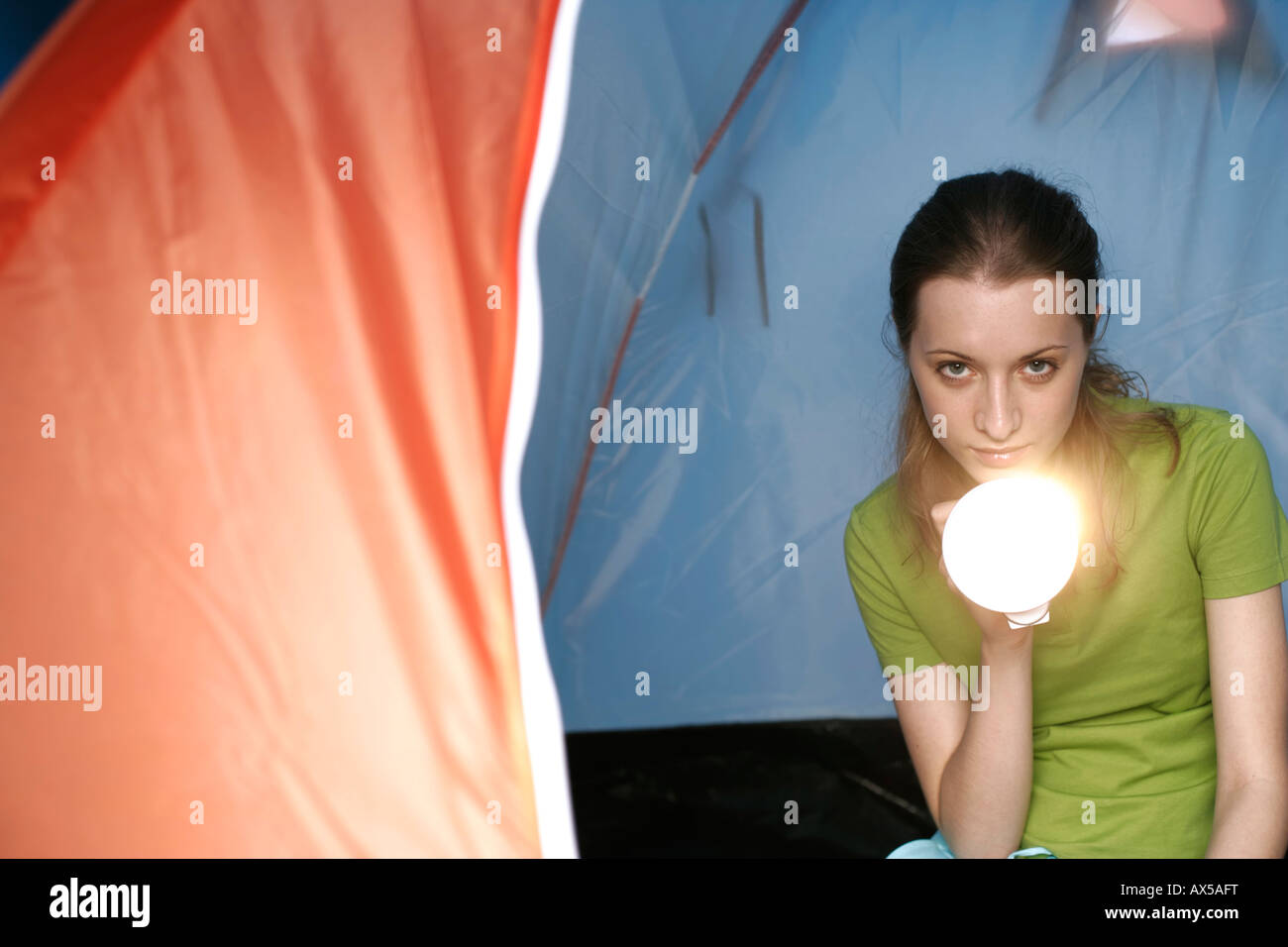 Person shining a torch hi-res stock photography and images - Alamy