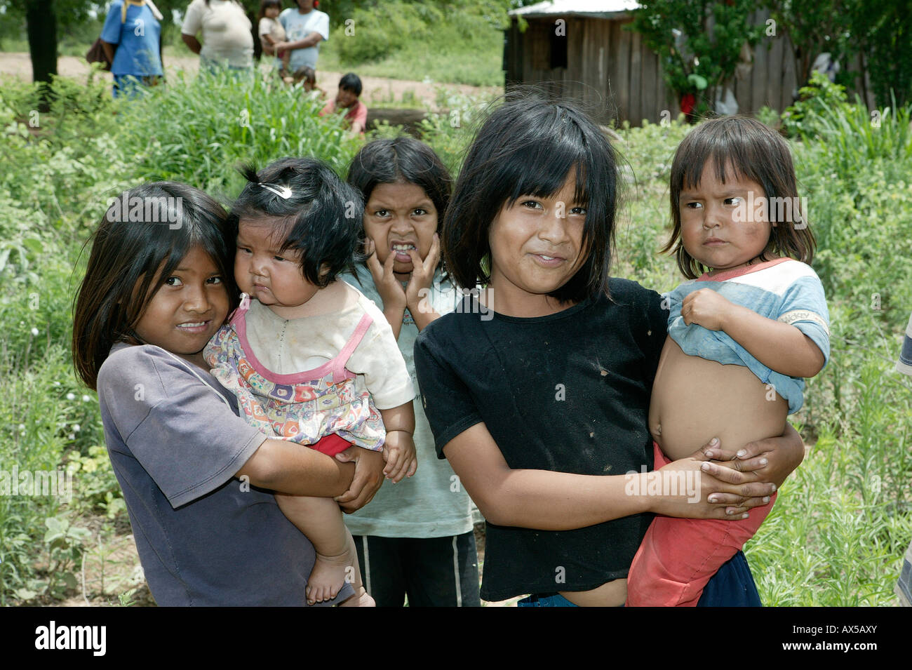 Two girls with children on their arms, Nivaclé Indians, Jothoisha ...