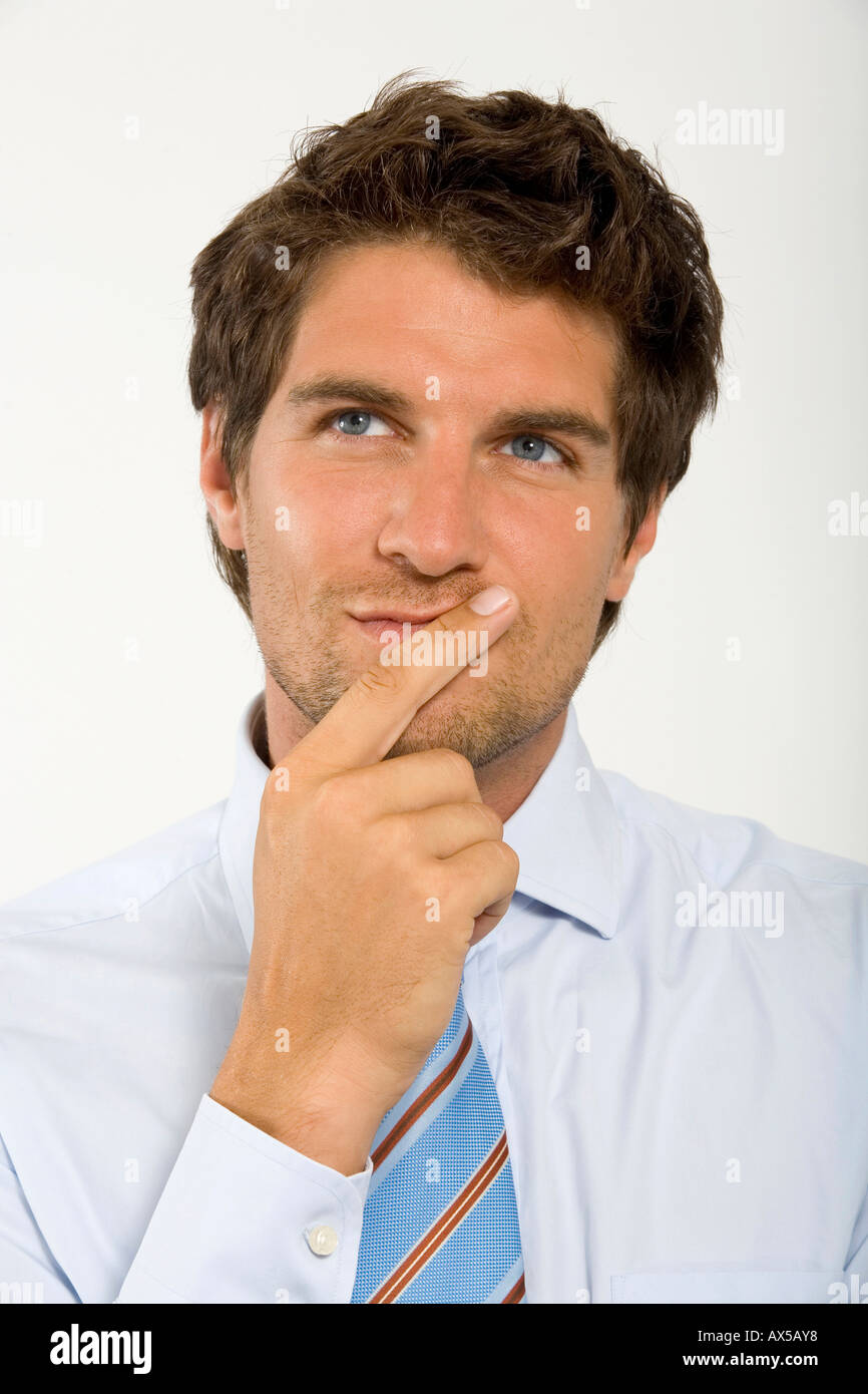 Pensive smiling Cut Out Stock Images & Pictures - Alamy