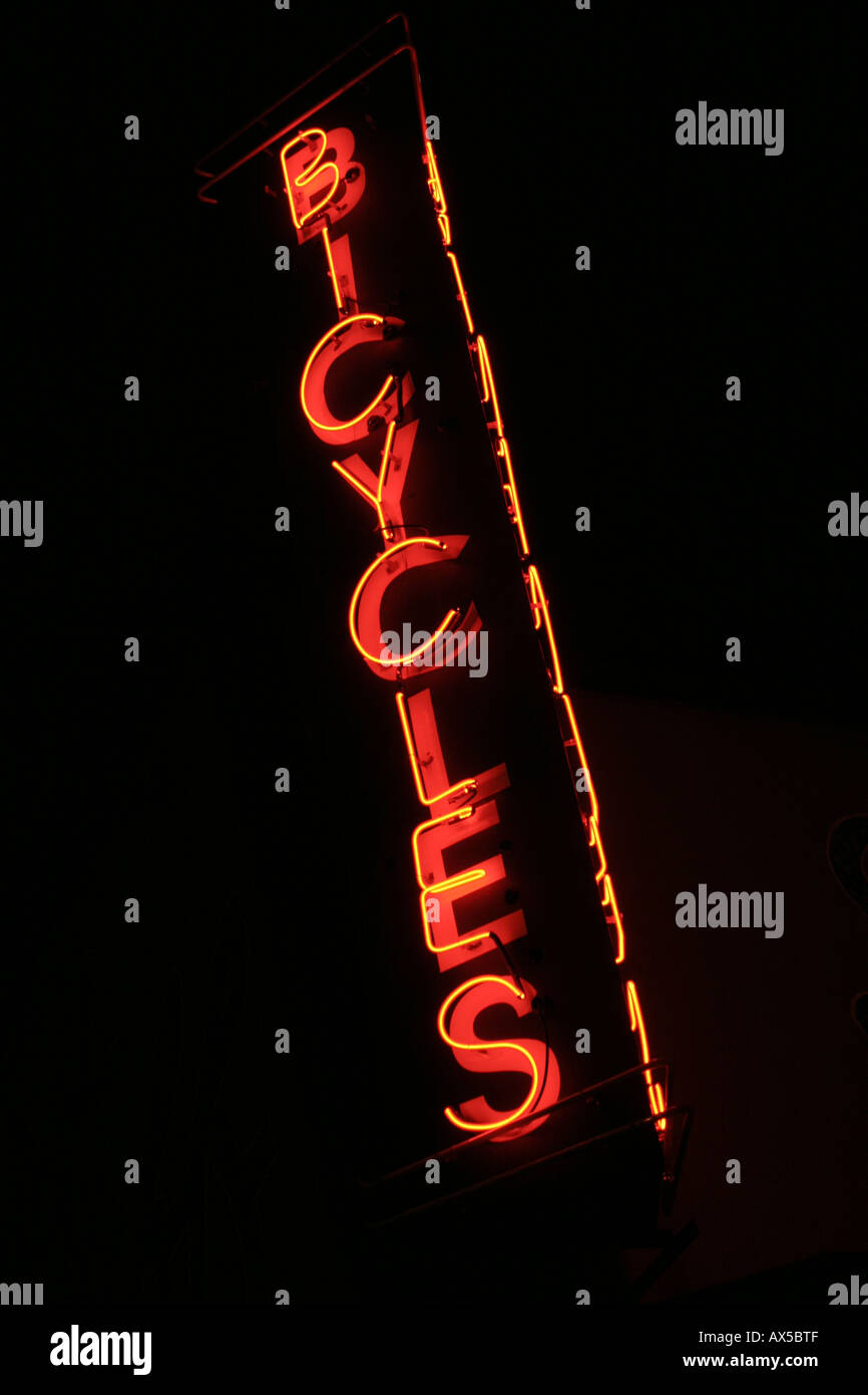 neon sign bicycles Stock Photo - Alamy