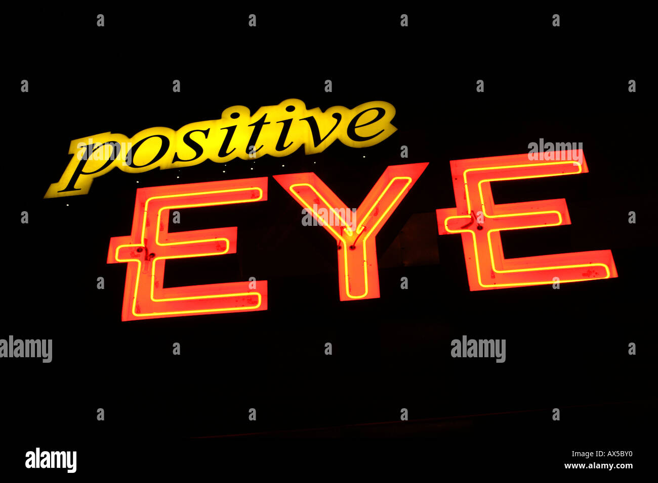 neon sign positive eye Stock Photo - Alamy