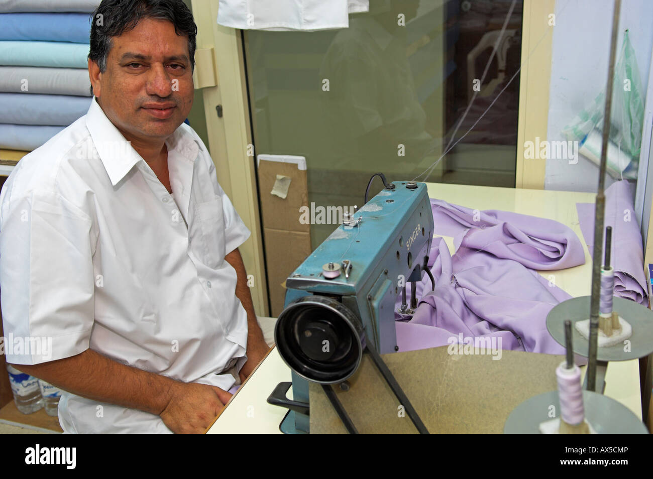 Indian tailor traditional sewing machine hi-res stock photography and ...