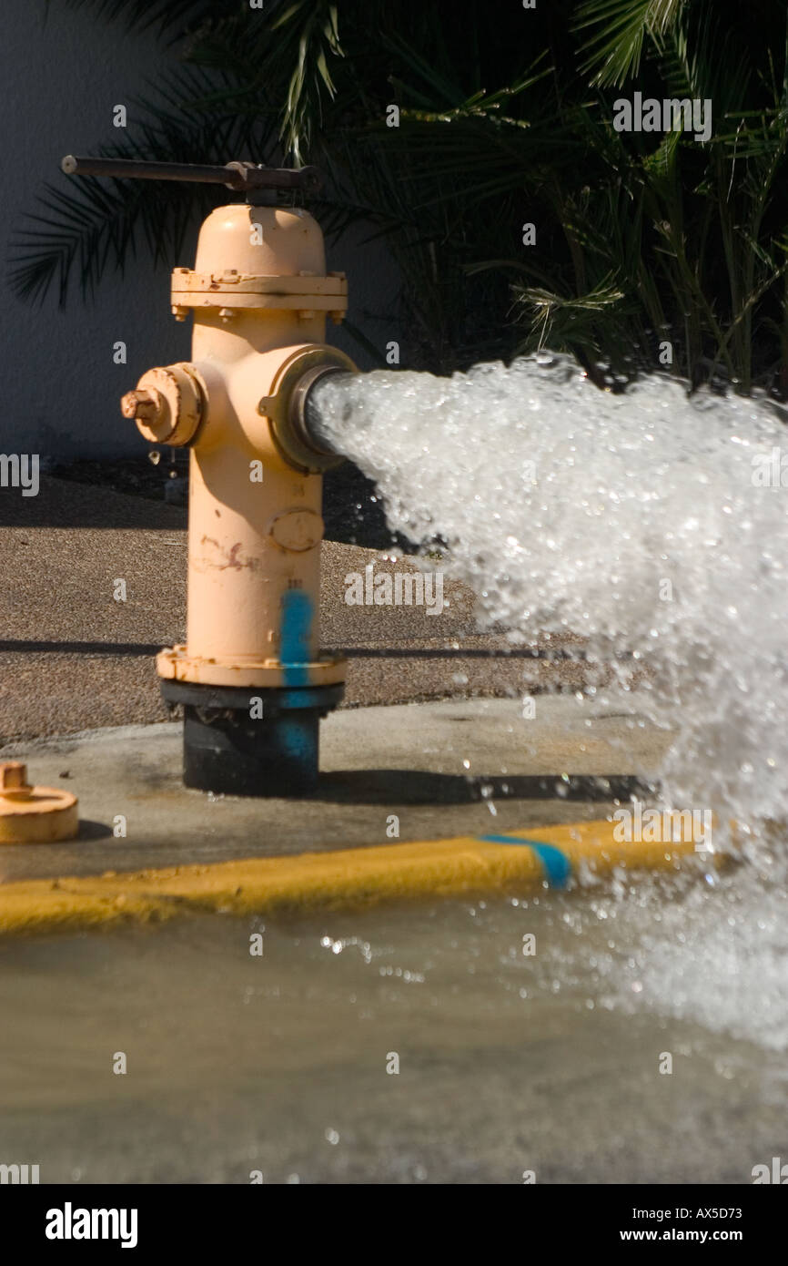 Fire Hydrant spilling water Stock Photo - Alamy