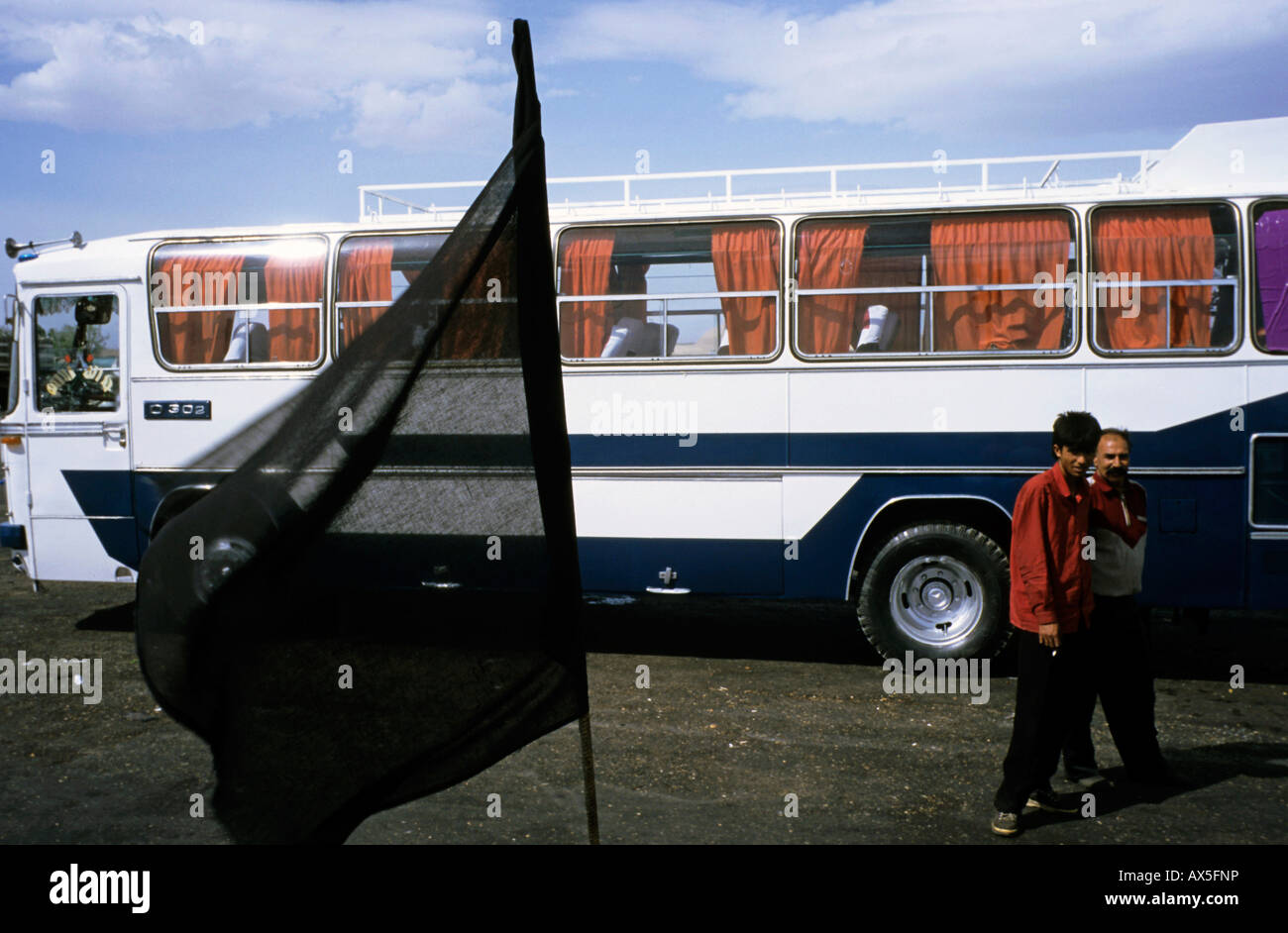 Black flag of the shiites, bus stop in Kerman, Iran Stock Photo - Alamy