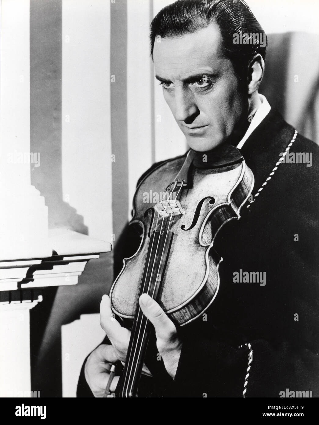 SHERLOCK HOLMES UK actor Basil Rathbone in the film role he made famous ...