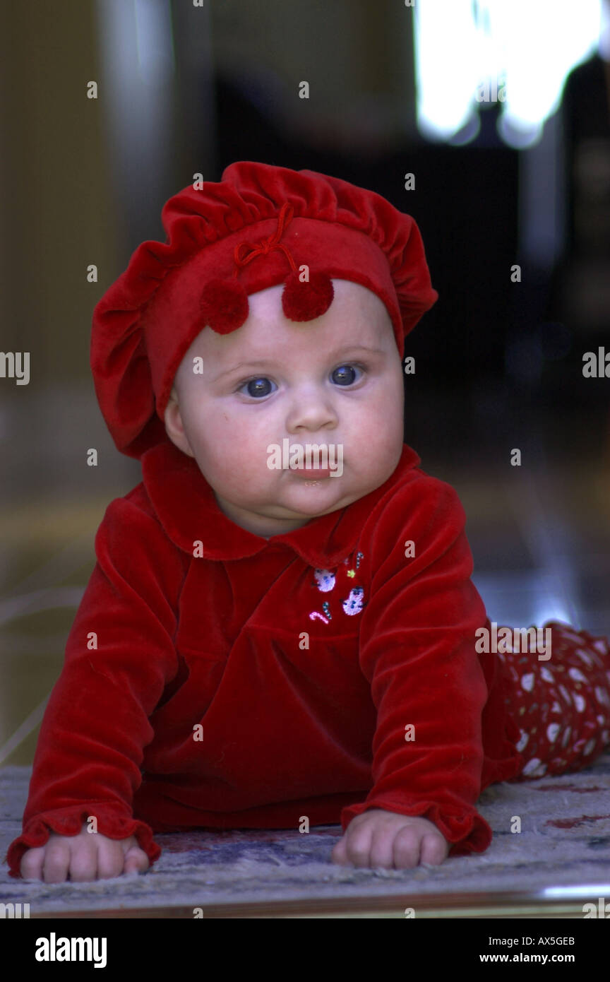 baby in red outfit Stock Photo - Alamy