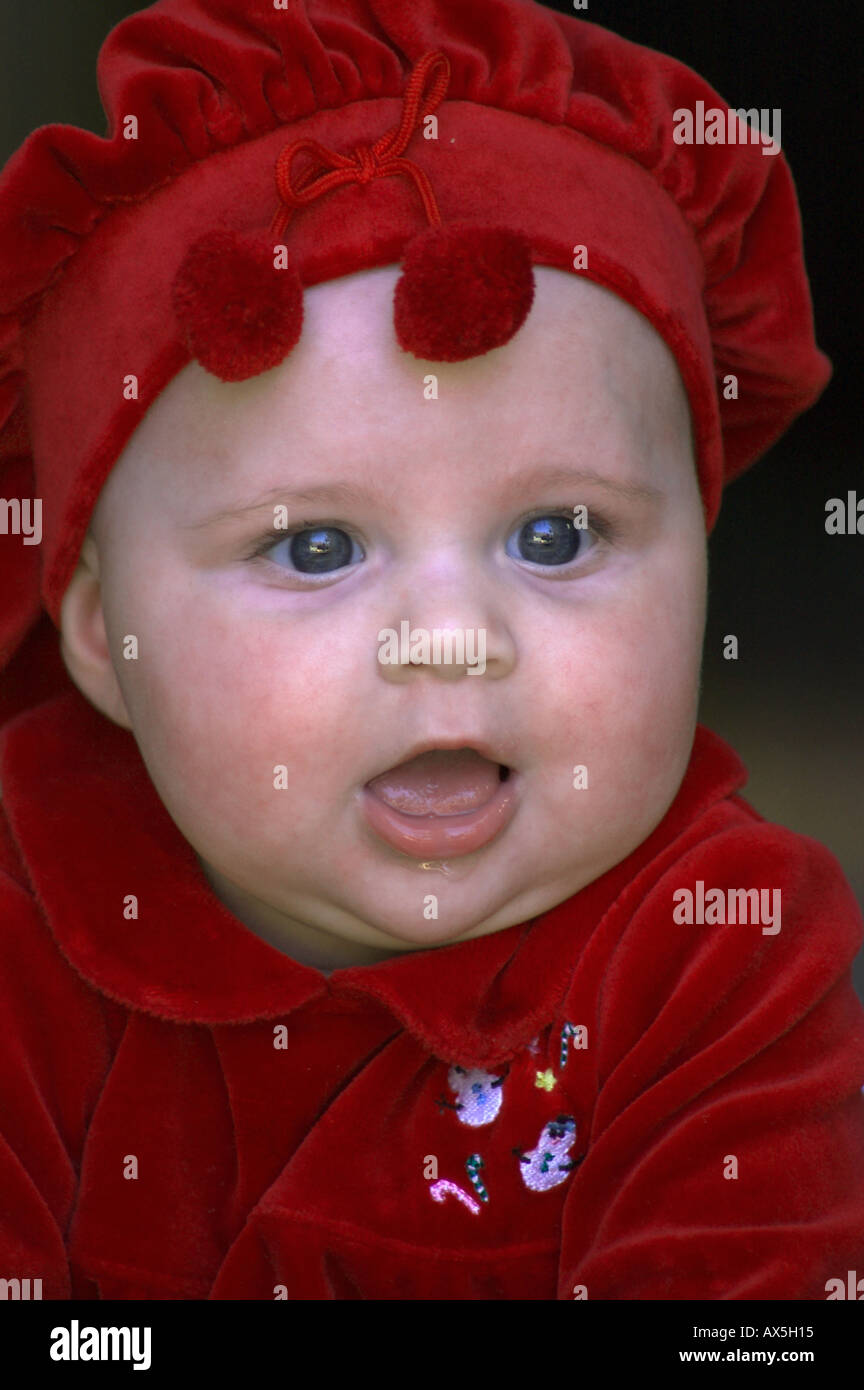 baby in red outfit Stock Photo - Alamy