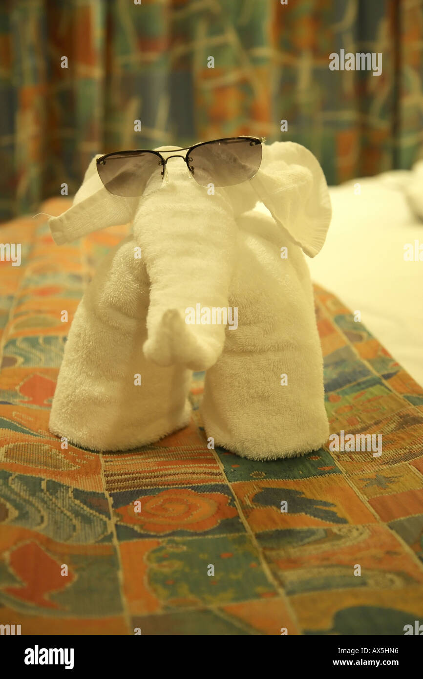 Elephant folded towel handmade Stock Photo - Alamy
