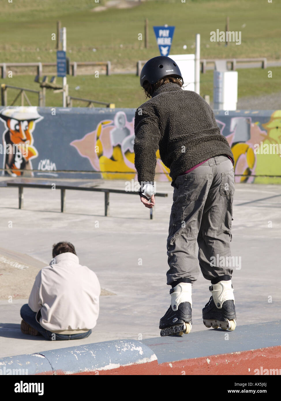 Young boy on roller blades hi-res stock photography and images - Alamy
