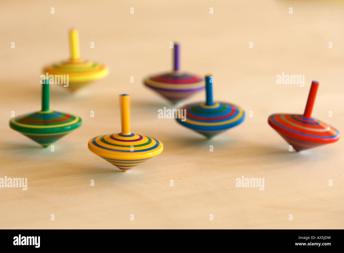 Colourful spinning tops Stock Photo - Alamy