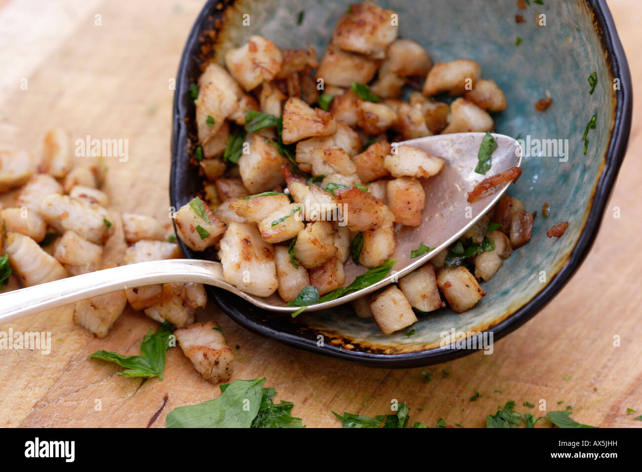 Fried turkey hen pieces with parsley Stock Photo - Alamy