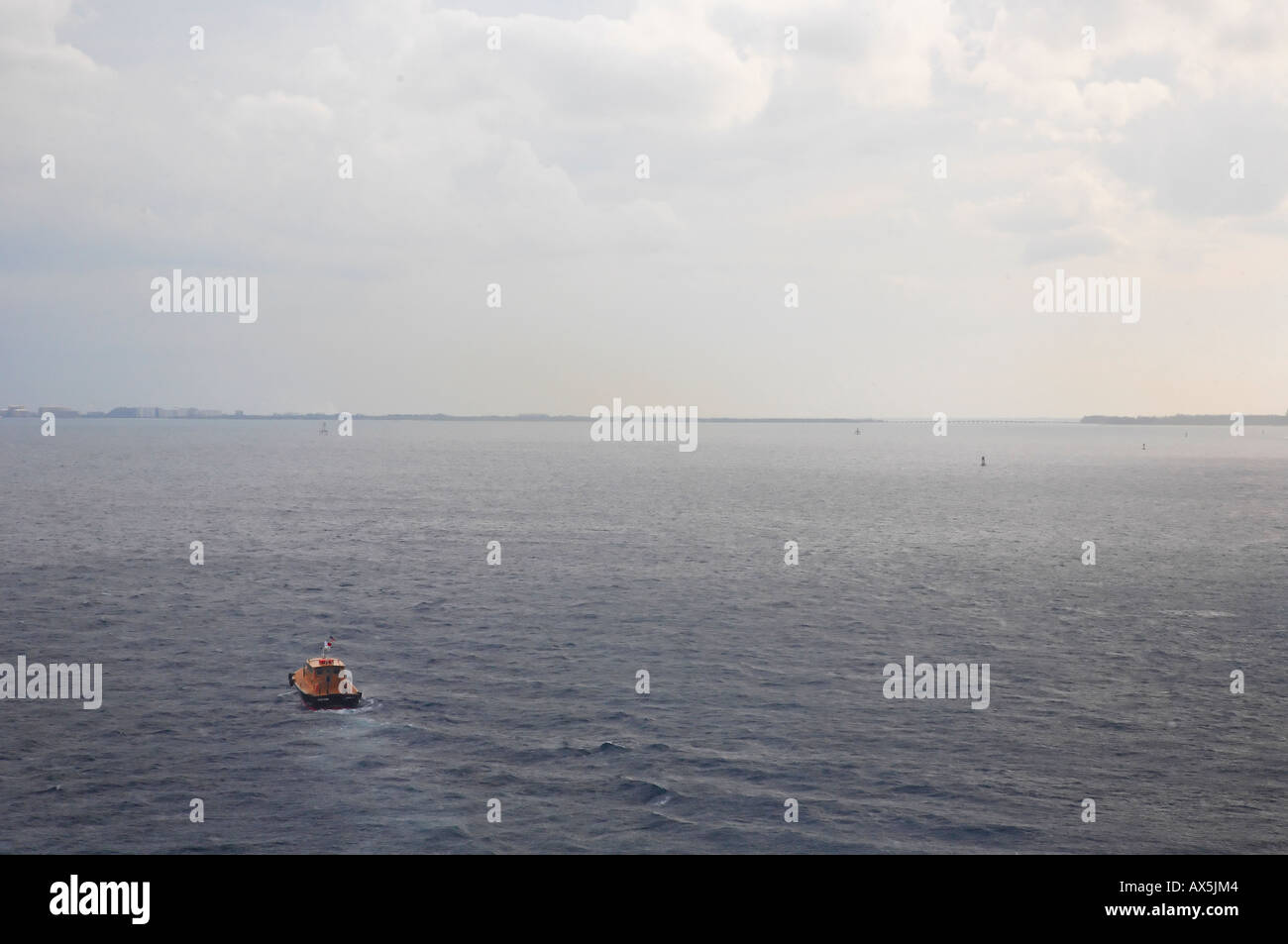 Pilot Boat sailing off in the distance Stock Photo - Alamy