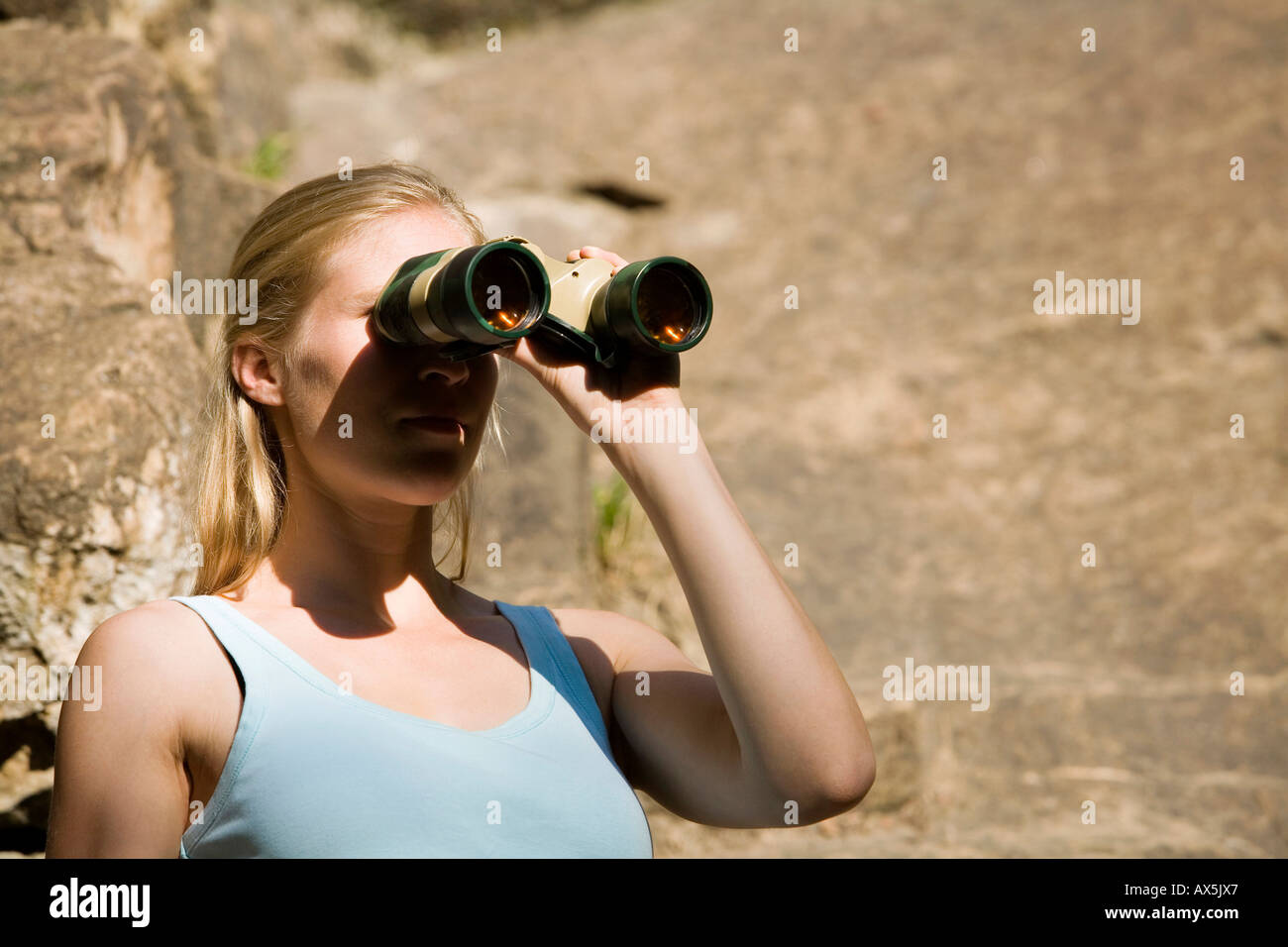 Women looking outside through glass hi-res stock photography and images ...