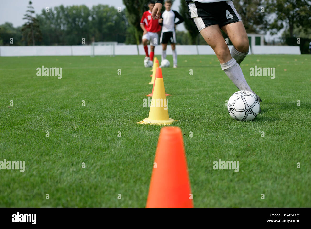 Soccer player running hi-res stock photography and images - Alamy