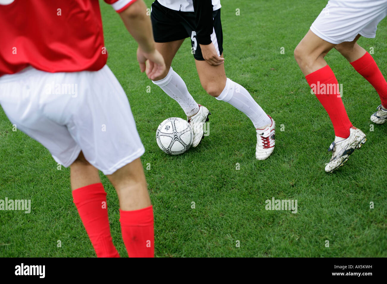 Soccer player in action Stock Photo - Alamy