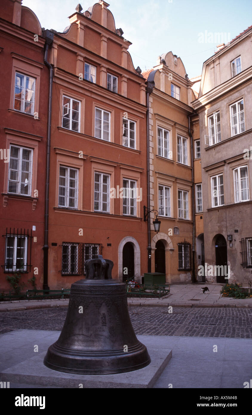 Warsaw, Poland. Cracked cathedral bell with typical buildings from the ...
