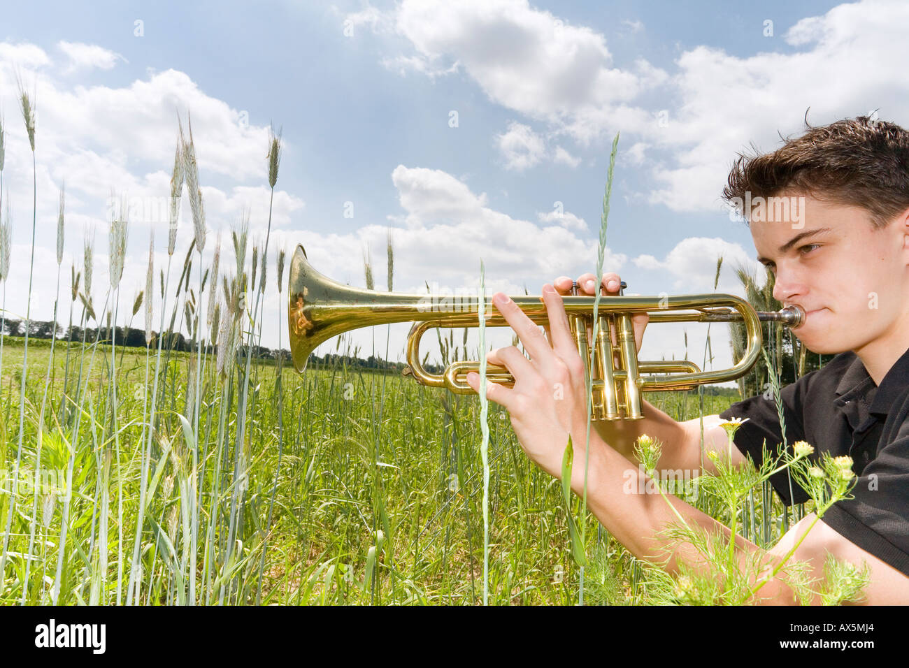 Side view young man playing hi-res stock photography and images - Alamy
