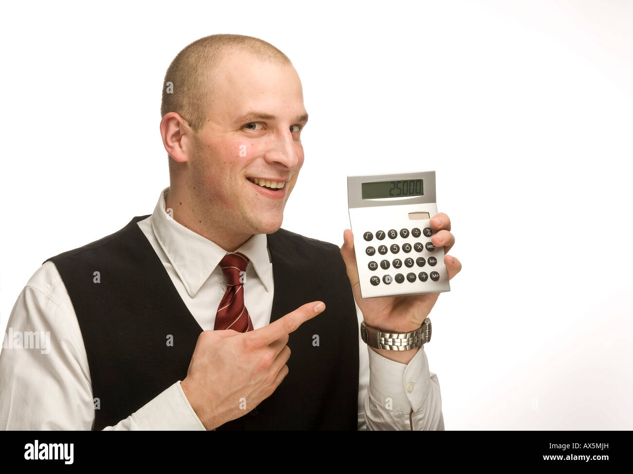 Young man holding a calculator Stock Photo - Alamy