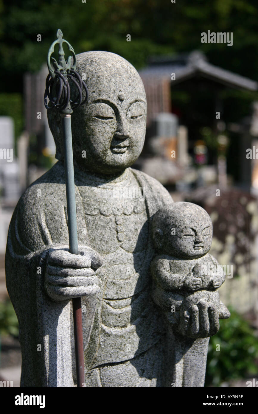 Stone jizo figure at a shinto shrine in Kyoto, Japan Stock Photo - Alamy