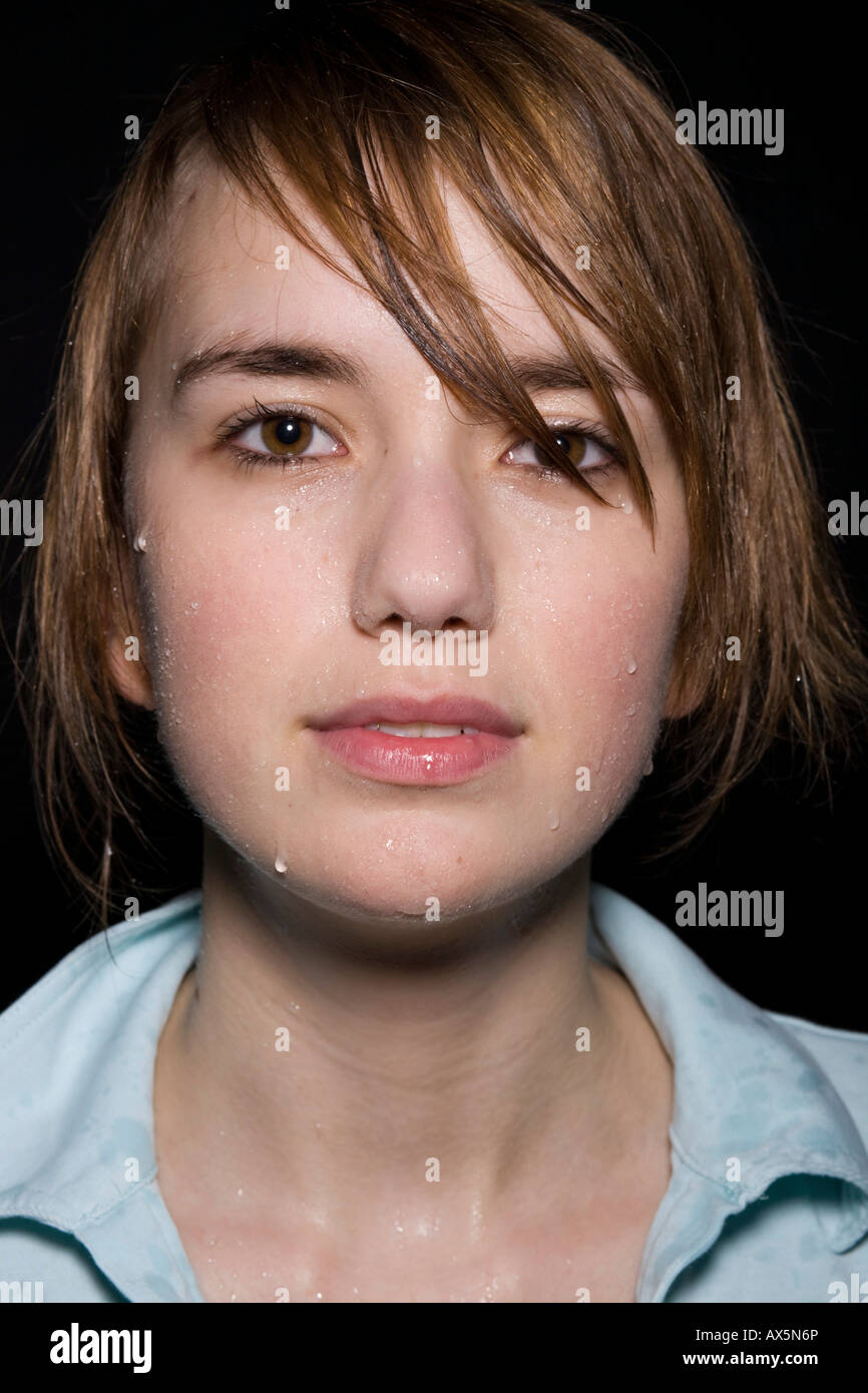 Young woman's wet face Stock Photo - Alamy