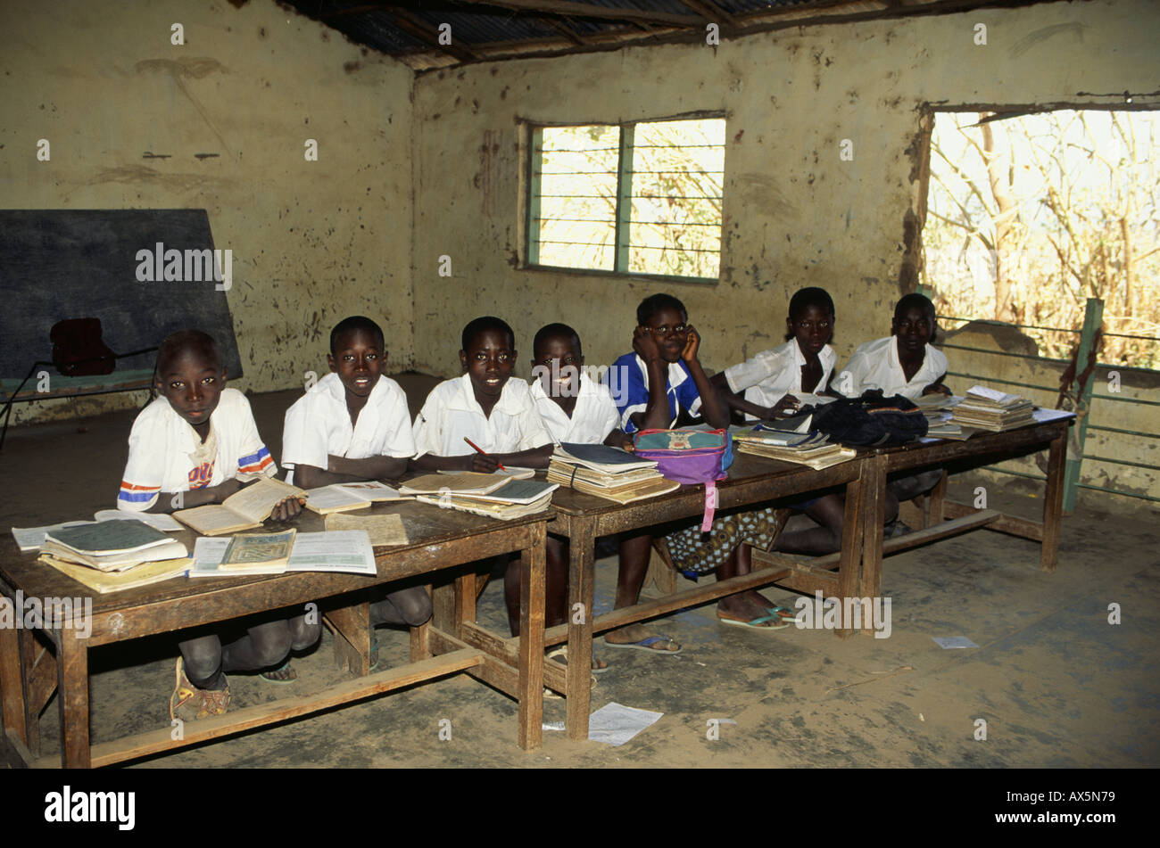 The Gambia; Africa. A rural schoolroom with pupils at desks full of ...