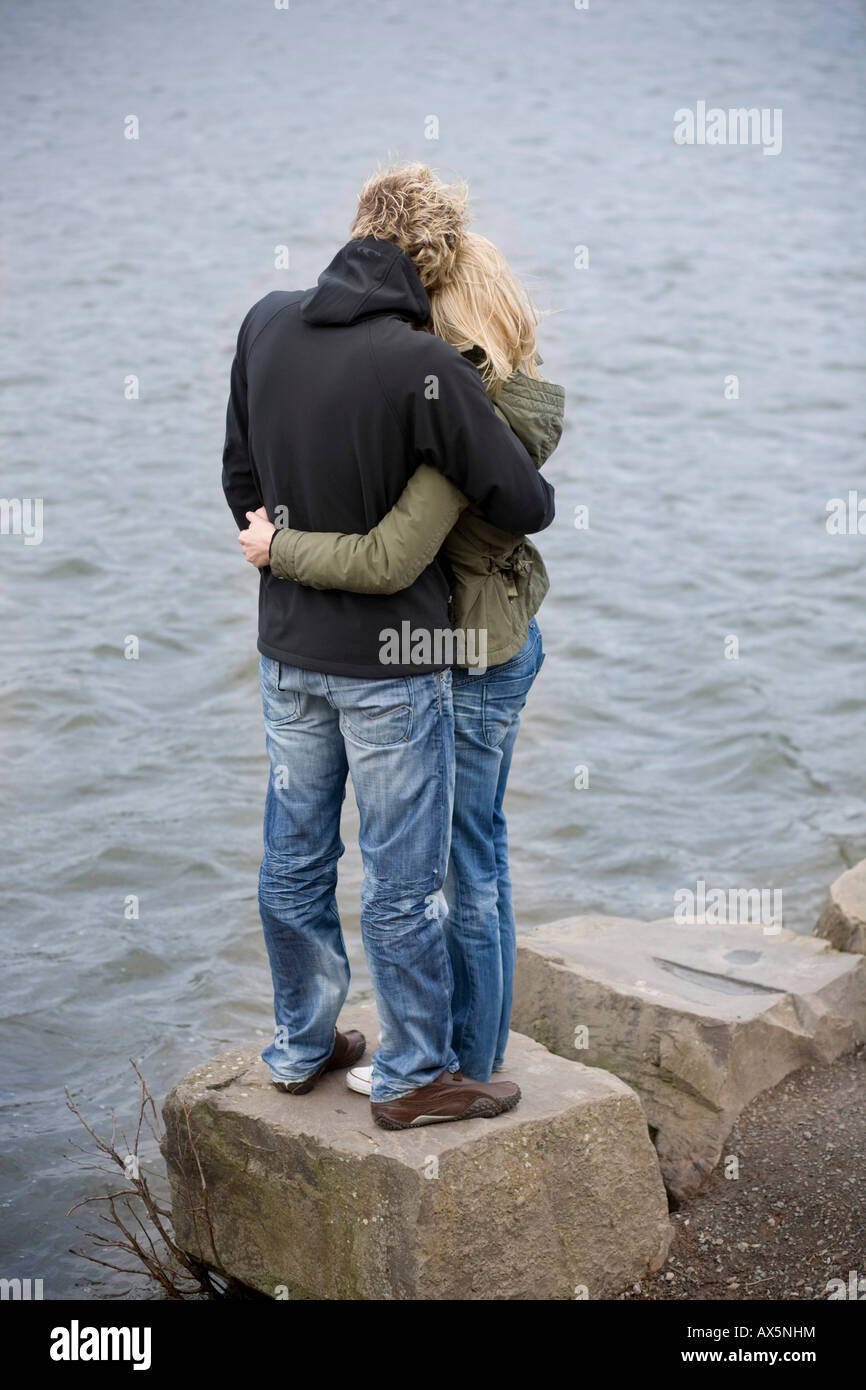 People hugging one another hi-res stock photography and images - Alamy