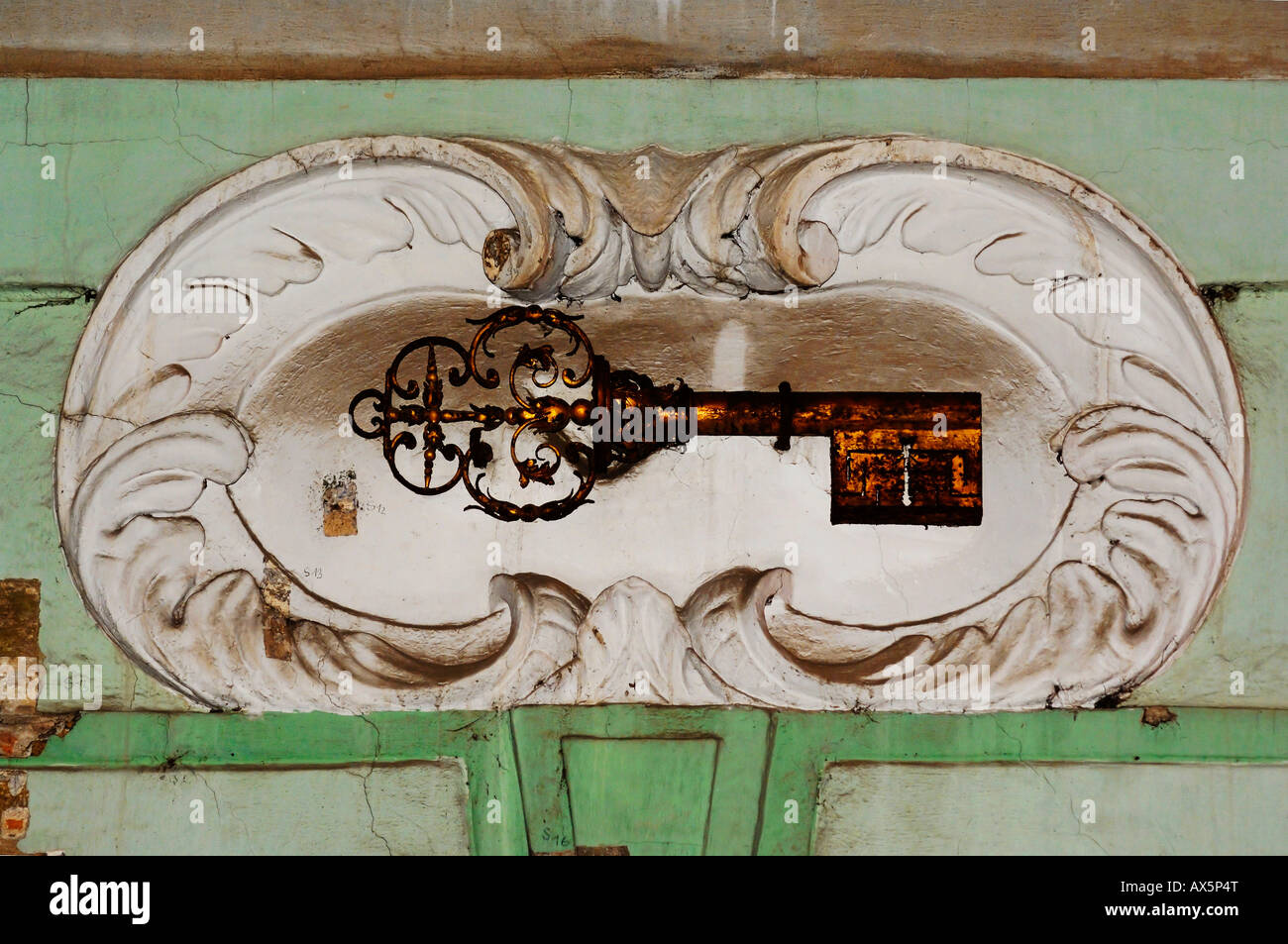 Key on a building facade in the old part of Prague, Czech Republic ...