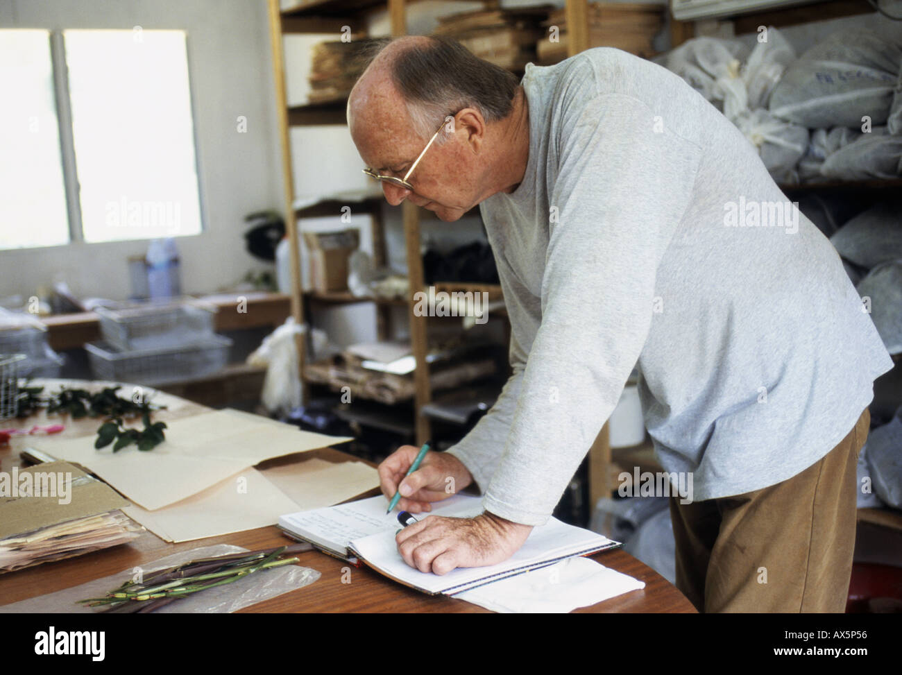 Makande, Gabon. Botanist Francis Halle working in the Base Camp ...