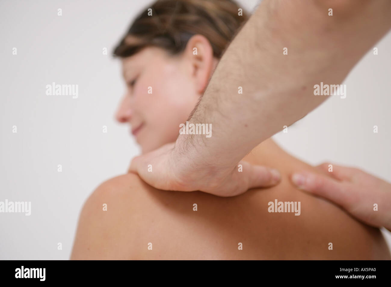 Woman massage therapist massaging hi-res stock photography and images ...