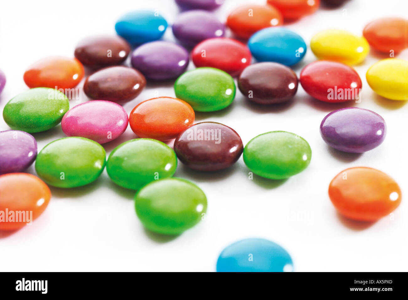 Chocolate candies with colored icing Stock Photo - Alamy