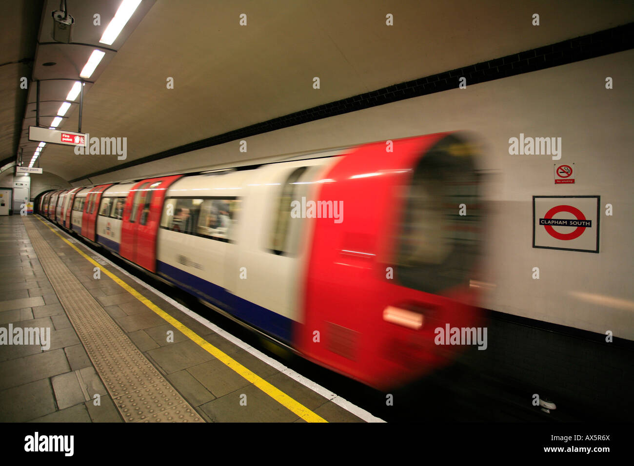 Train arriving at Clapham South underground station, London, England ...