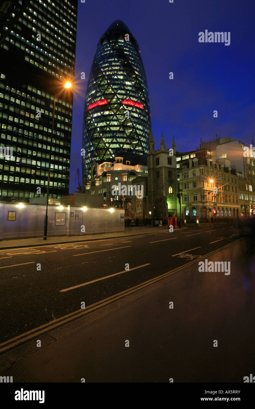 Swiss Re Tower (aka 30 St. Mary Axe, "The Gherkin") at dusk, London ...