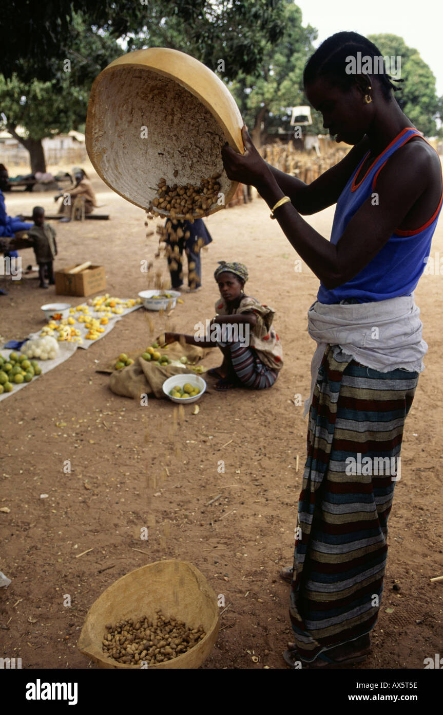African Woman Selling Groundnuts High Resolution Stock Photography and ...