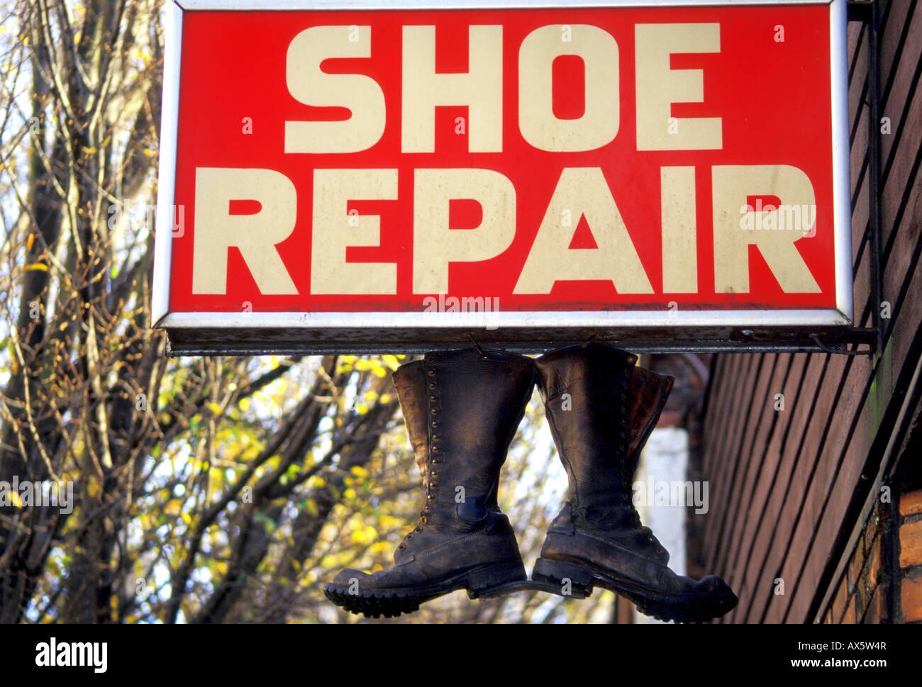 Shoe repair sign Stock Photo - Alamy
