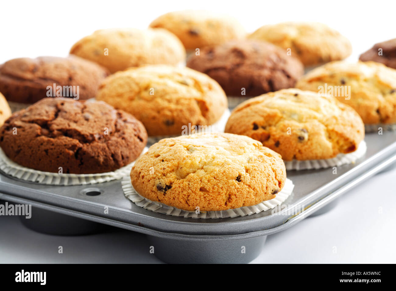 Muffins in backing pan Stock Photo - Alamy