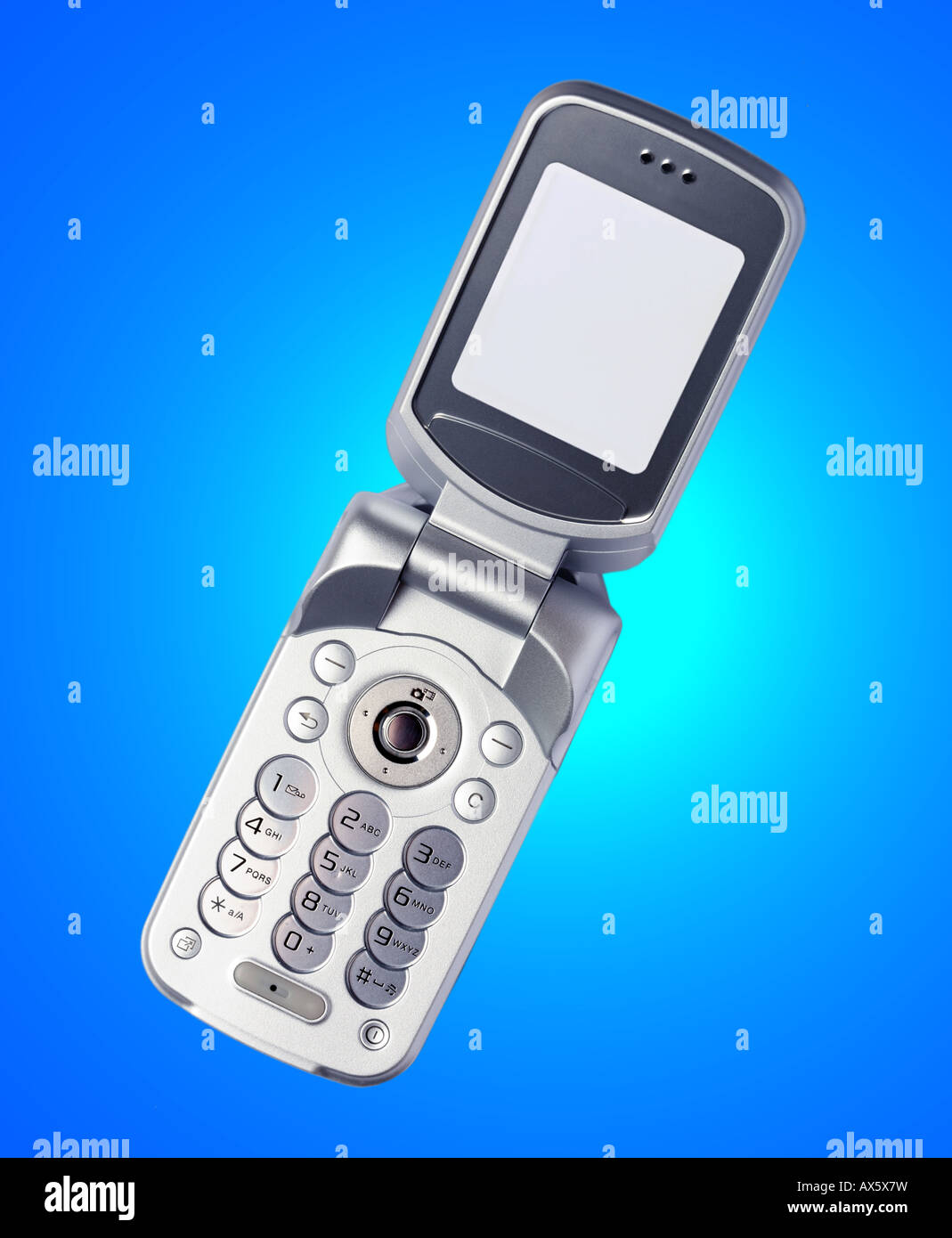 Open cellphone against blue background Stock Photo - Alamy
