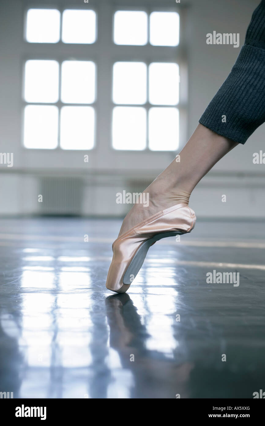 A female ballet dancer wearing a ballet shoe Stock Photo - Alamy
