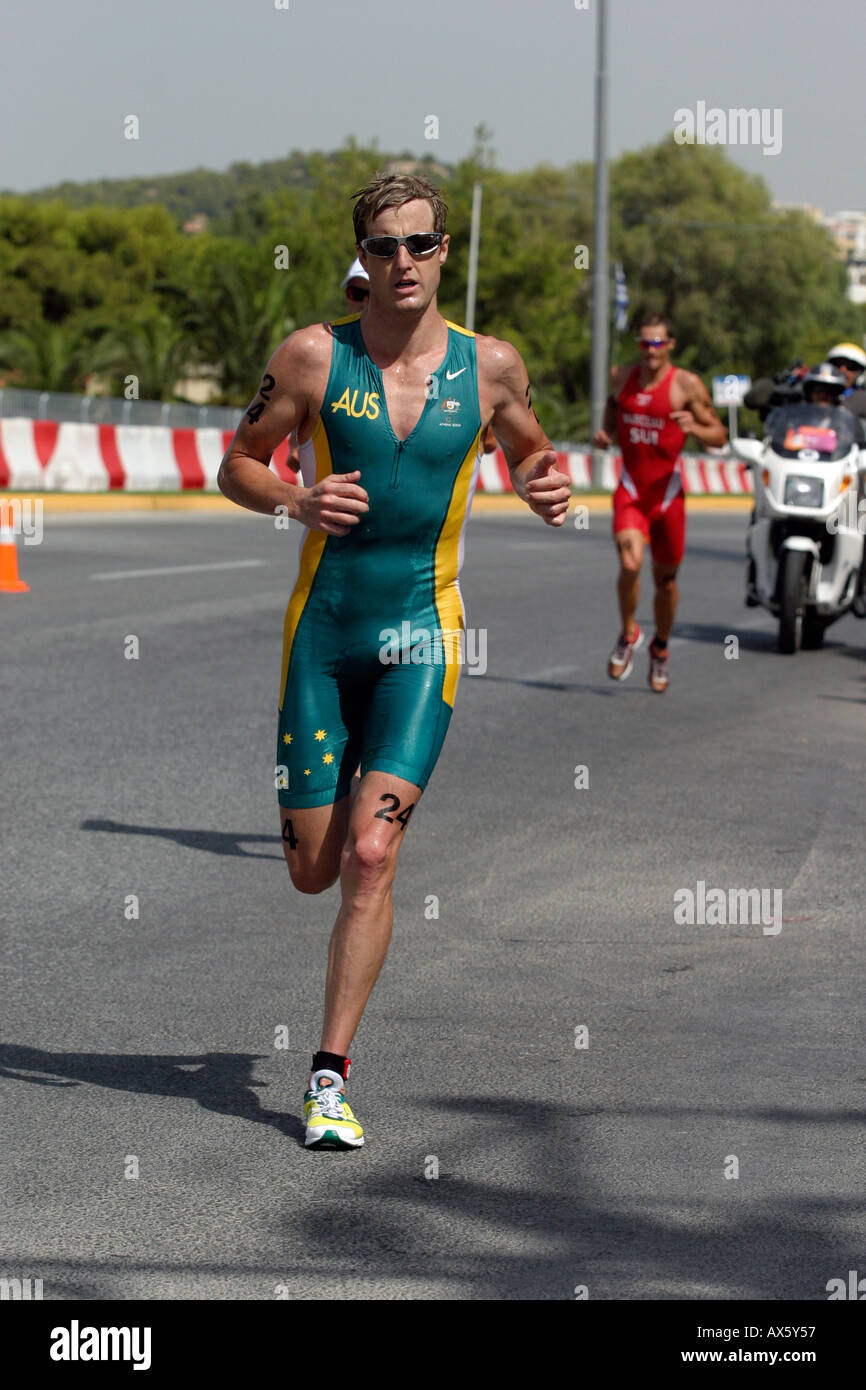 Greg Bennett AUS out on the run section of the triathlon course along ...