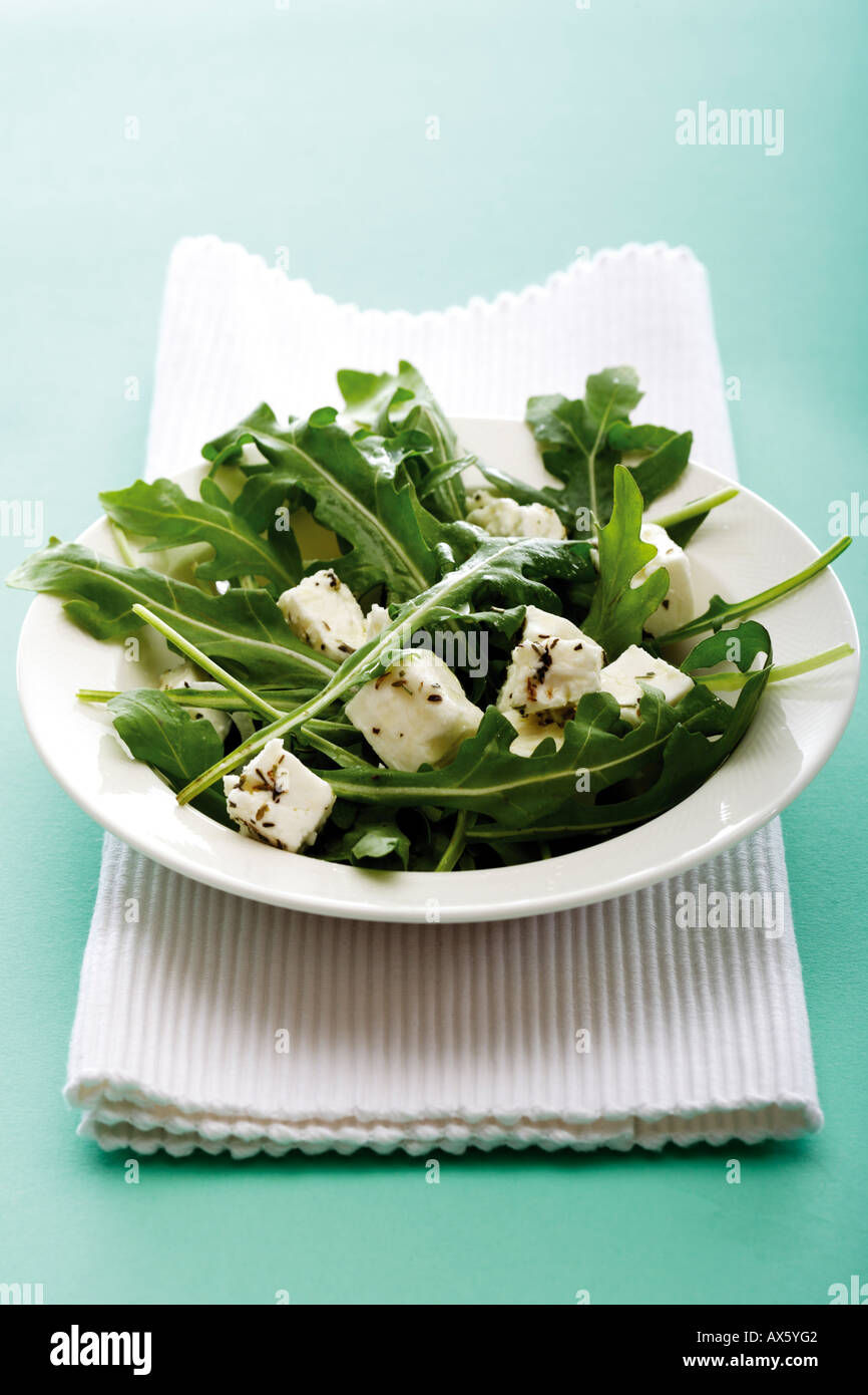 Rocket salad with feta cheese Stock Photo - Alamy