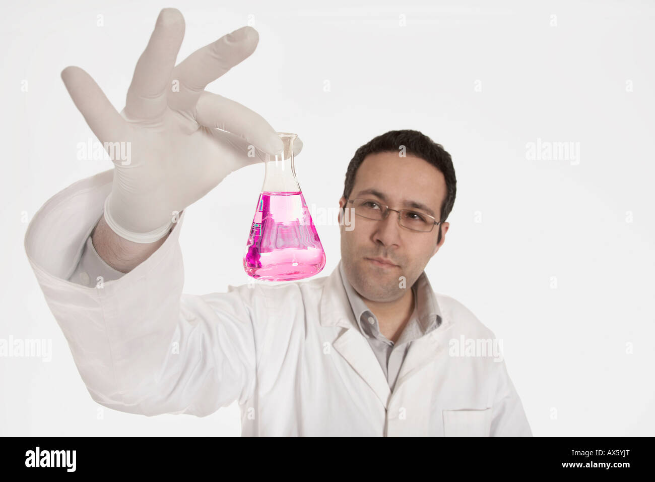 Chemist holding chemical substance camera hi-res stock photography and ...