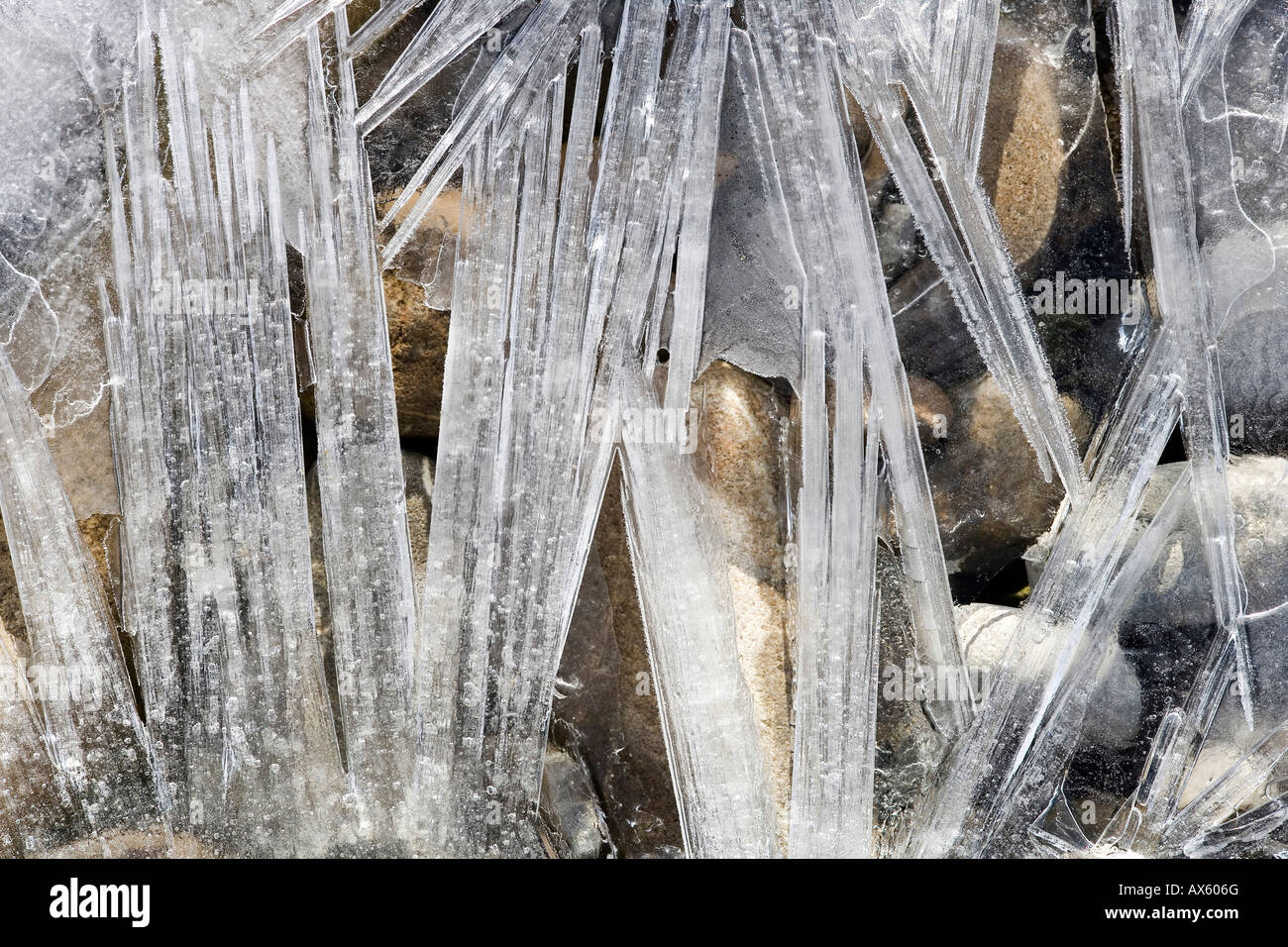 Stones frozen in ice, interesting ice formations Stock Photo - Alamy