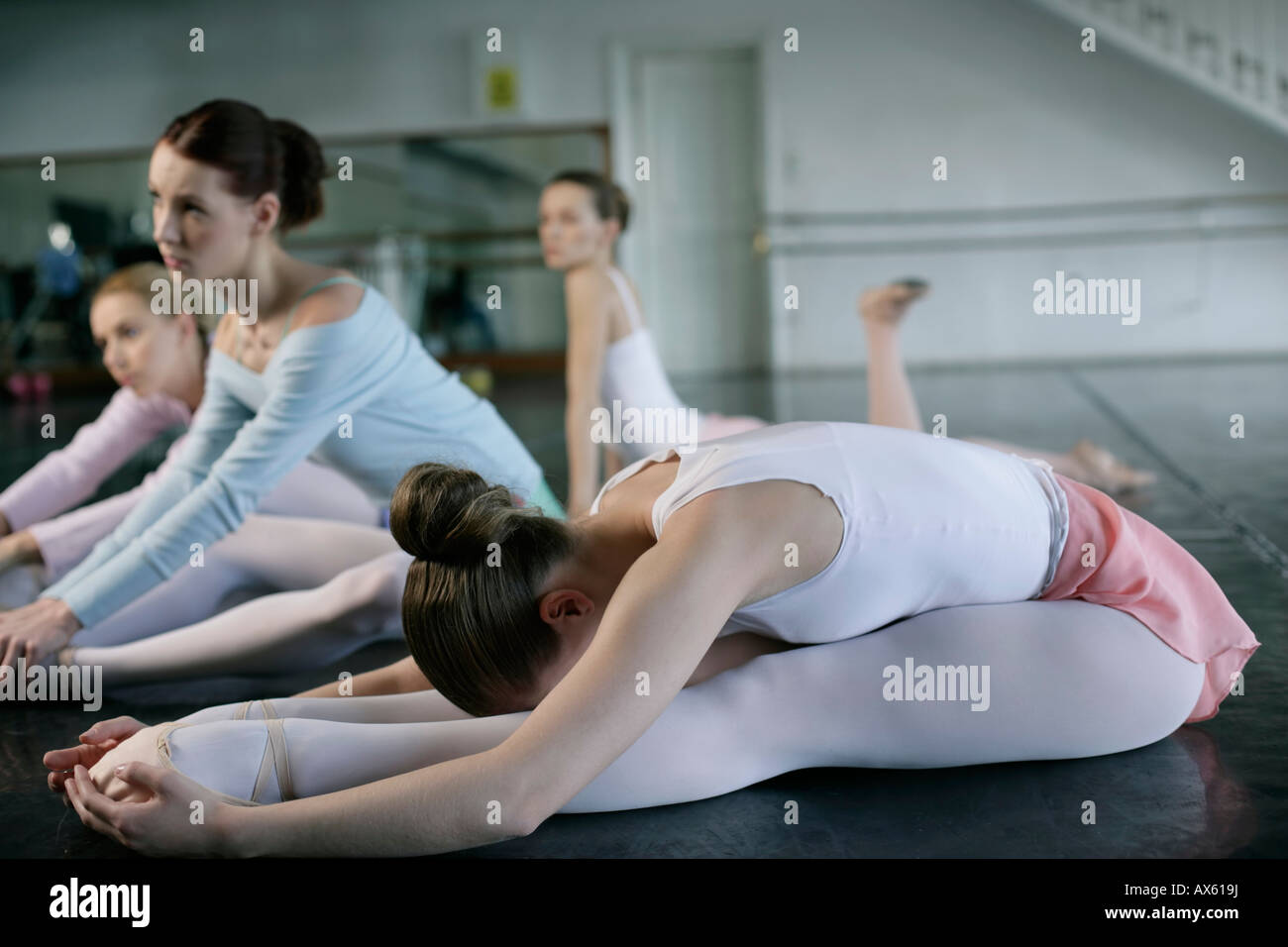 Female ballet dancers warming up Stock Photo - Alamy