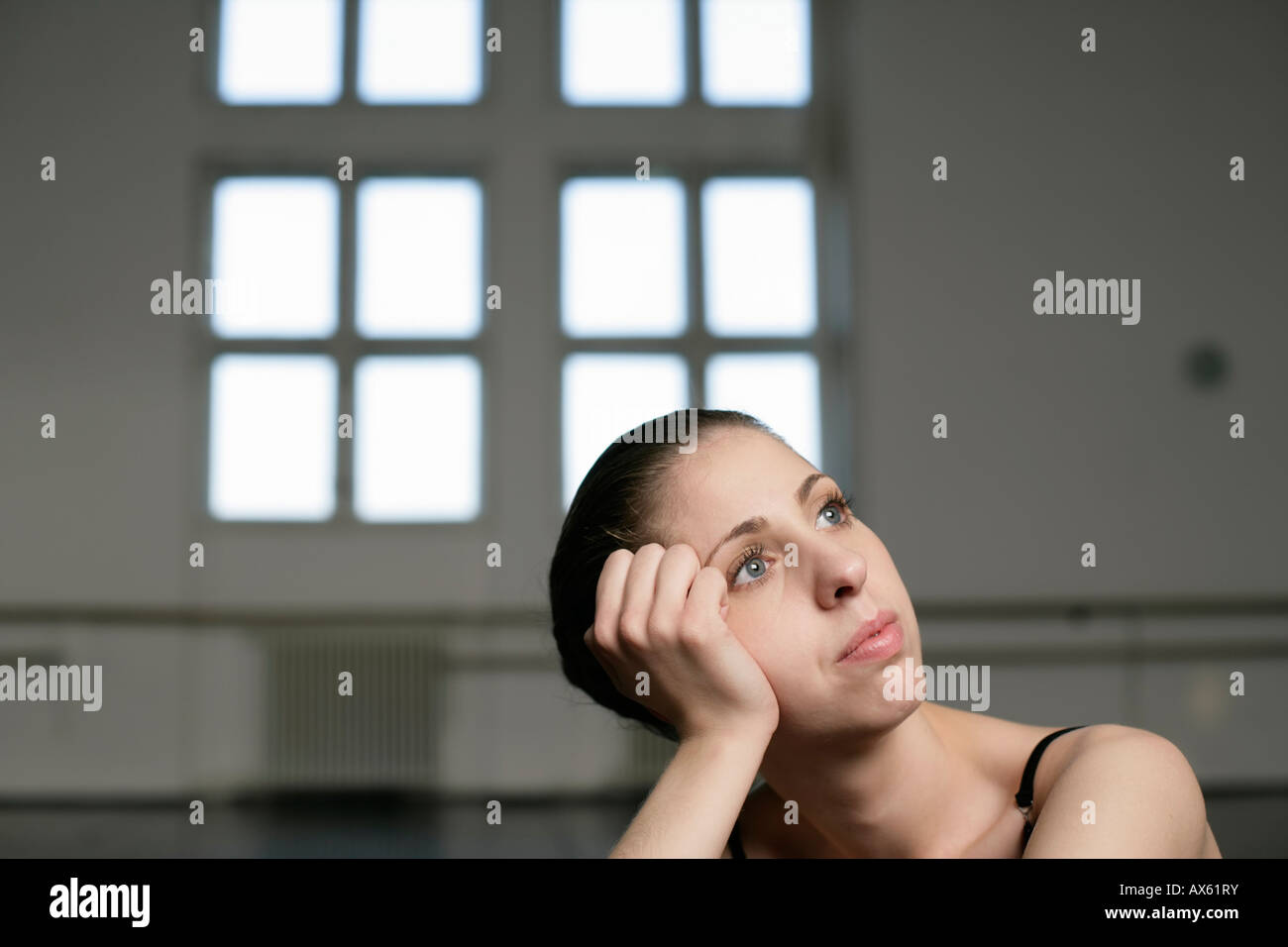 A reflective female ballet dancer Stock Photo - Alamy