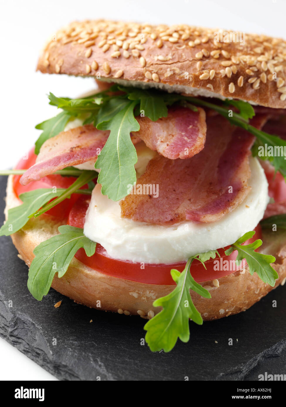 Italian bagel mozzarella tomato bacon editorial food Stock Photo - Alamy